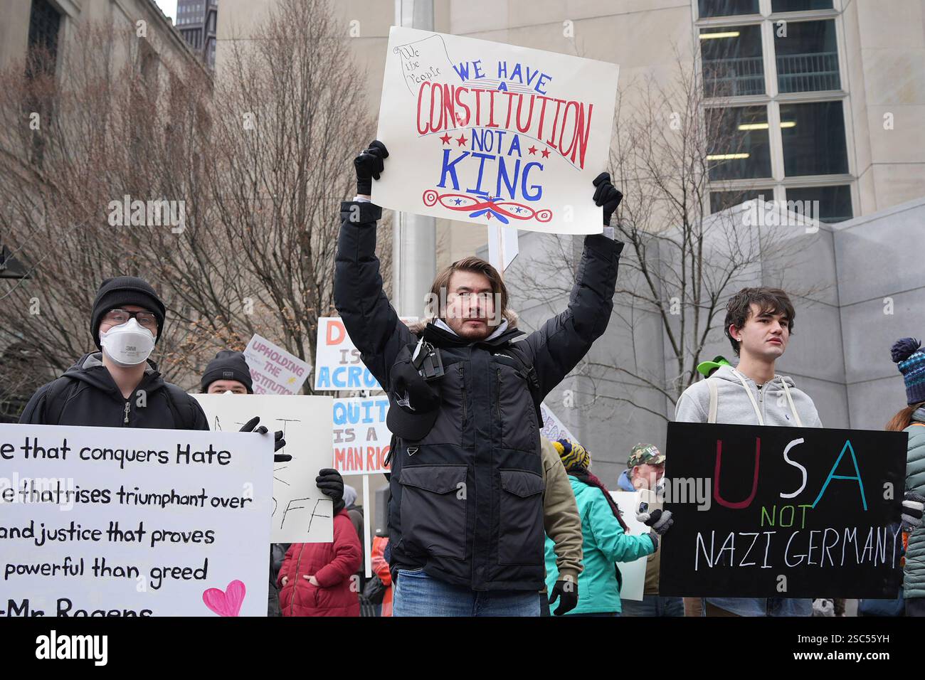 People protest outside the federal courthouse in Pittsburgh on ...