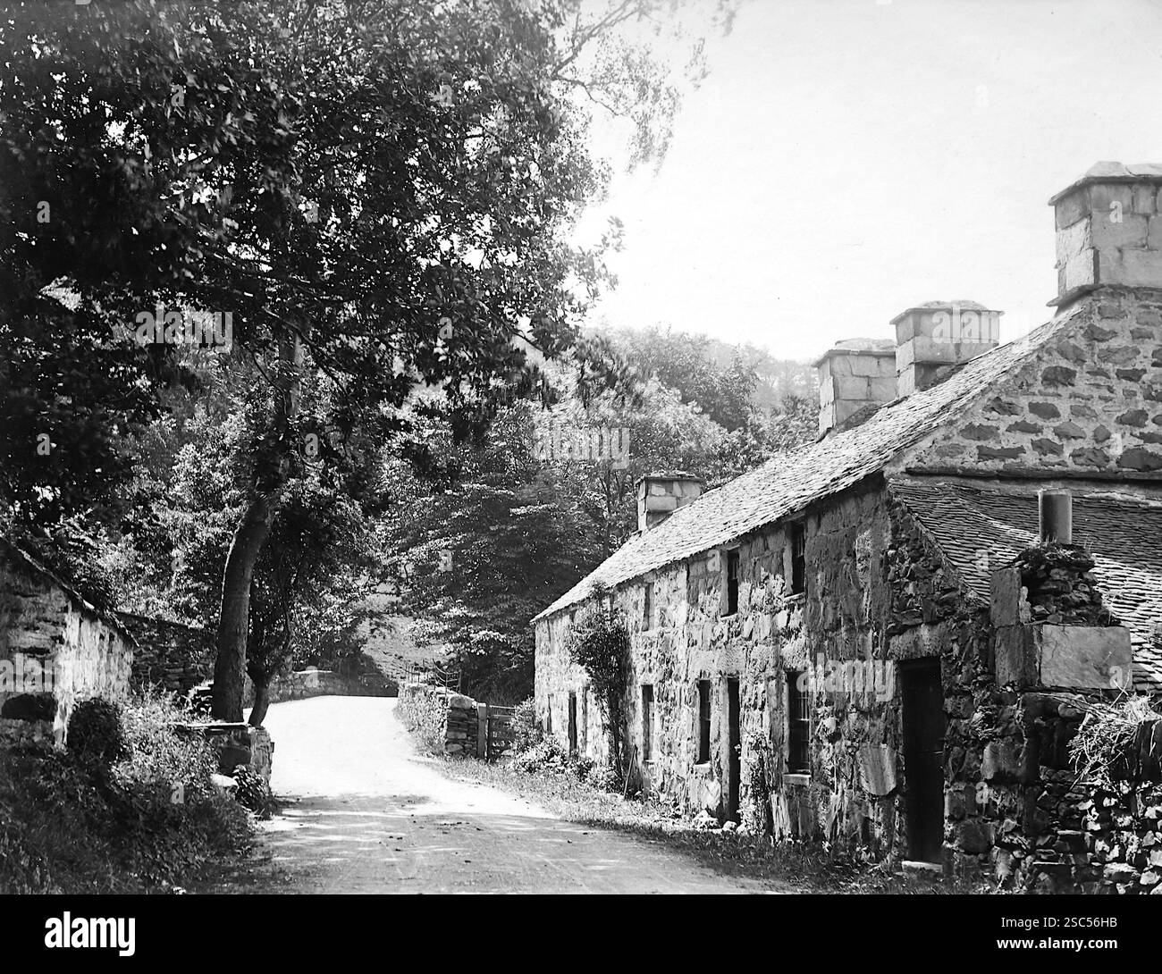 Stone built cottages in the old village of Arthog in the Meirionnydd ...