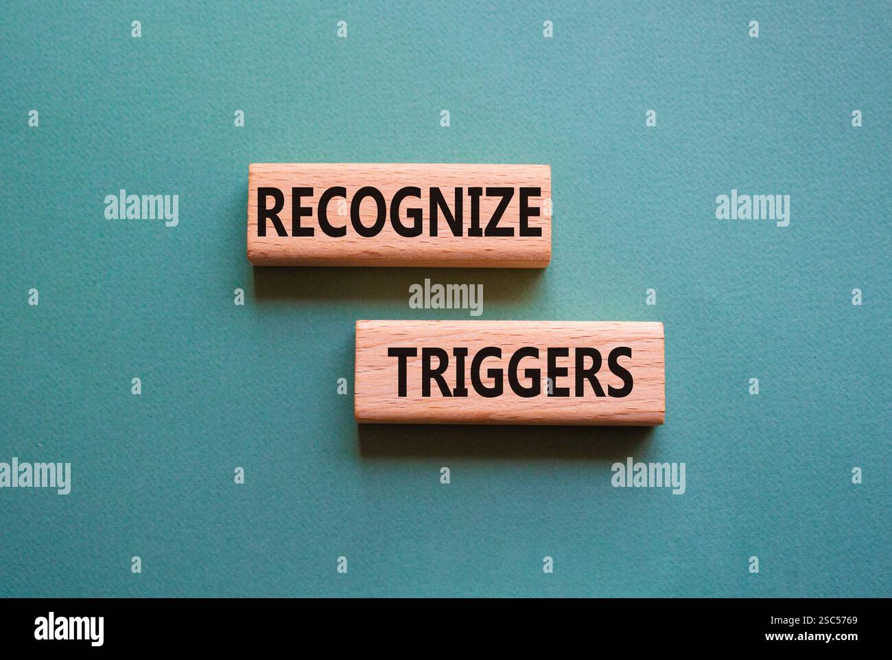 Recognize triggers symbol. Concept words Recognize triggers on wooden ...