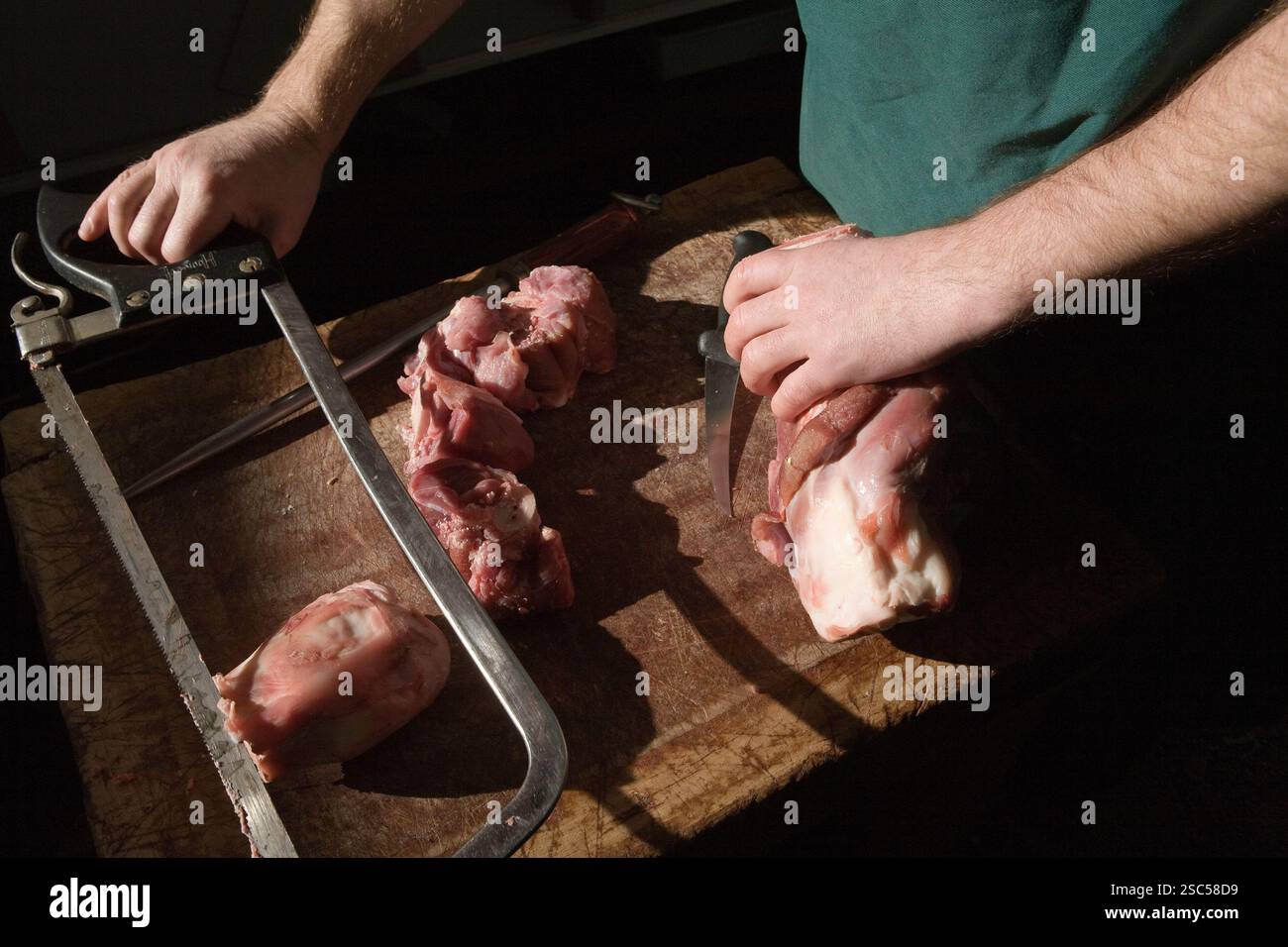 Farmer Andrew Sharp with meat in his cold store at Borough Market ...