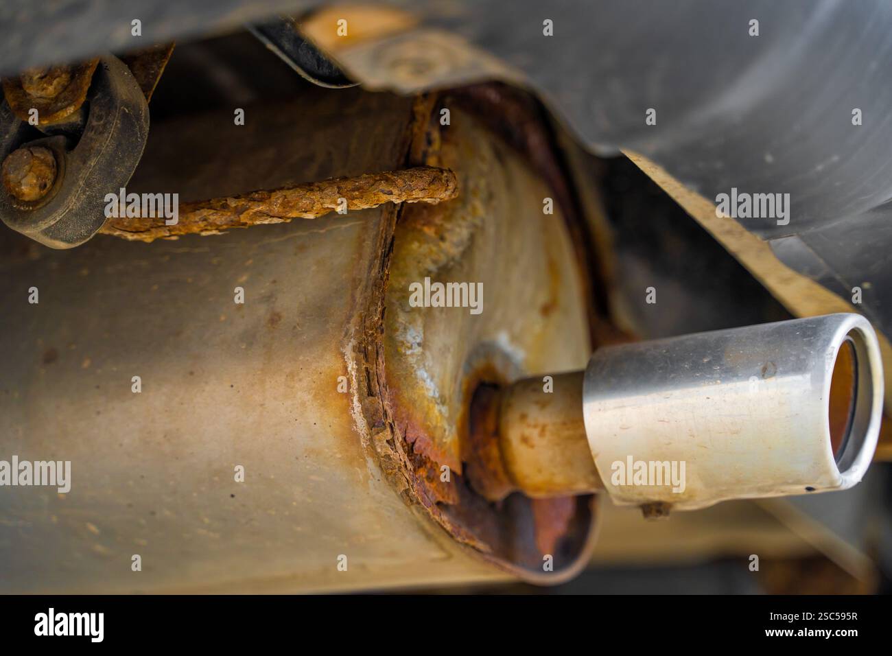 Car muffler in severe corrosion close-up Stock Photo - Alamy