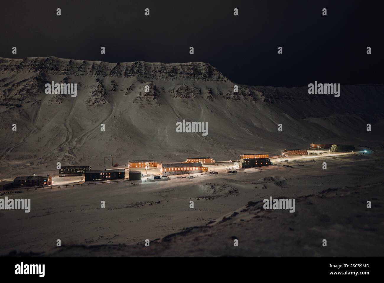 View of Nybyen in Longyearbyen, Svalbard at night from atop ...