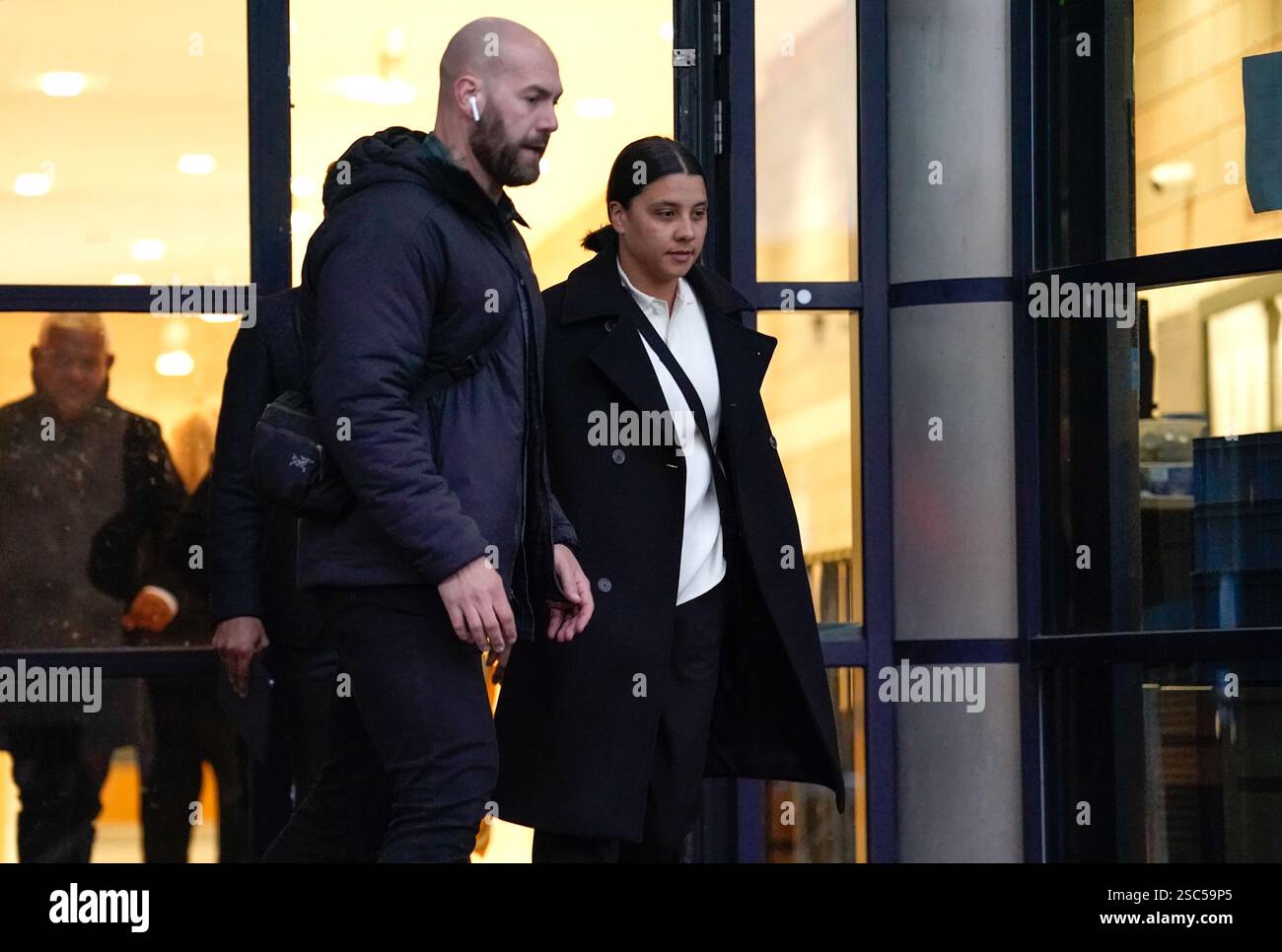 Chelsea and Australia striker Sam Kerr (right) leaves Kingston Crown ...