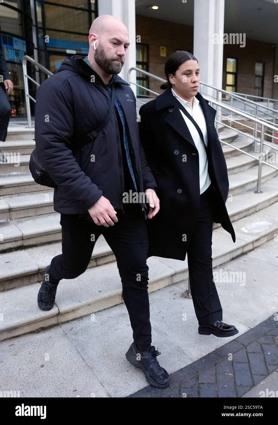 Chelsea and Australia striker Sam Kerr (right) leaves Kingston Crown ...
