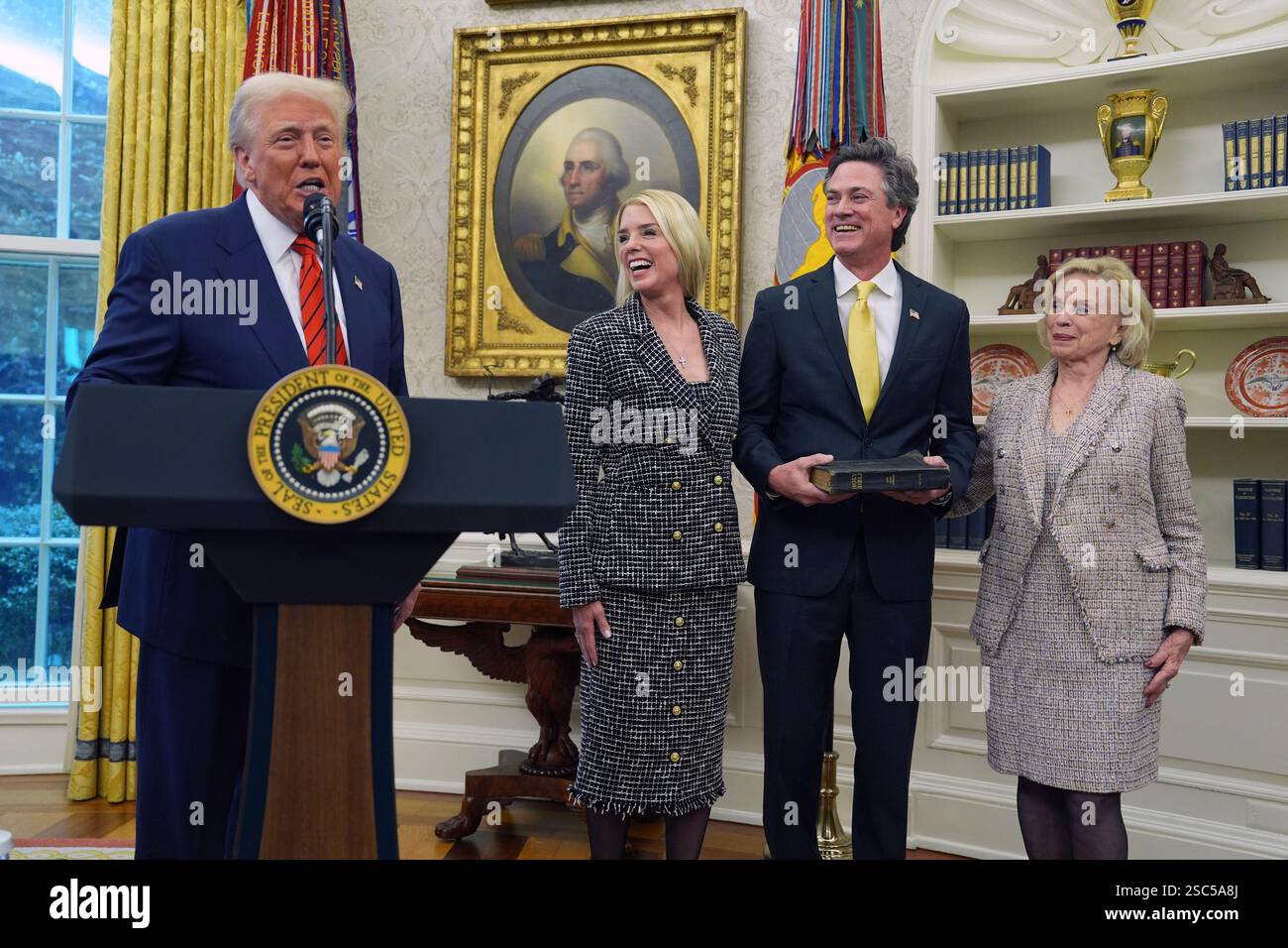 President Donald Trump speaks before Pam Bondi is sworn in as Attorney ...
