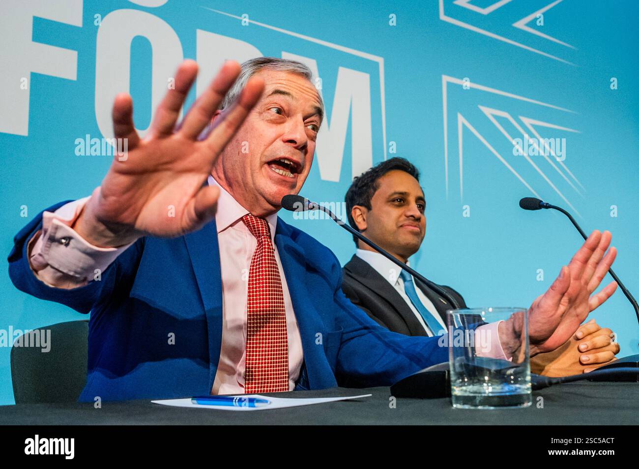 London, UK. 5th Feb, 2025. Nigel Farage MP and Zia Yusuf lead a Reform ...
