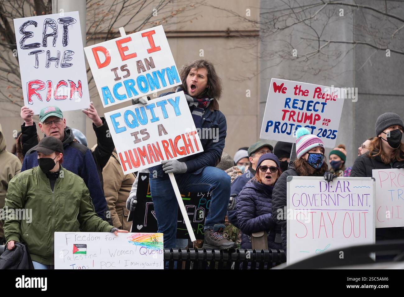 People protest outside the federal courthouse in Pittsburgh on ...