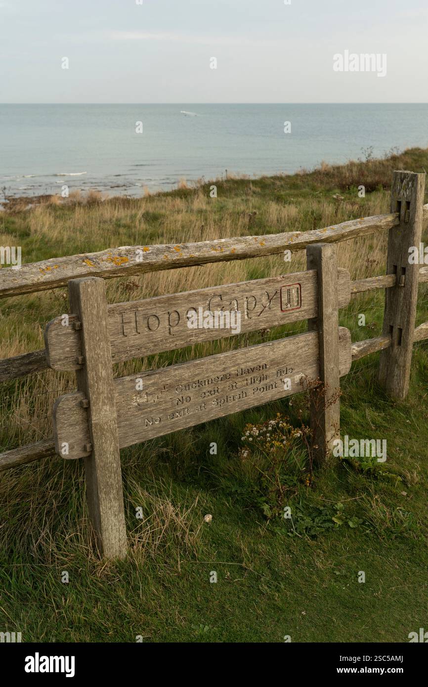 Wooden sign at Hope Gap, White Cliffs of Dover, UK, warns of no exit at ...
