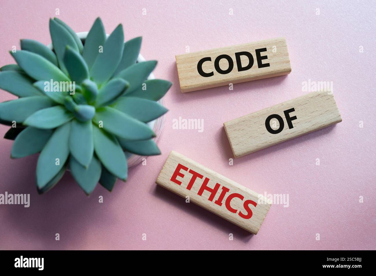 Code of ethics symbol. Concept words Code of ethics on wooden blocks ...