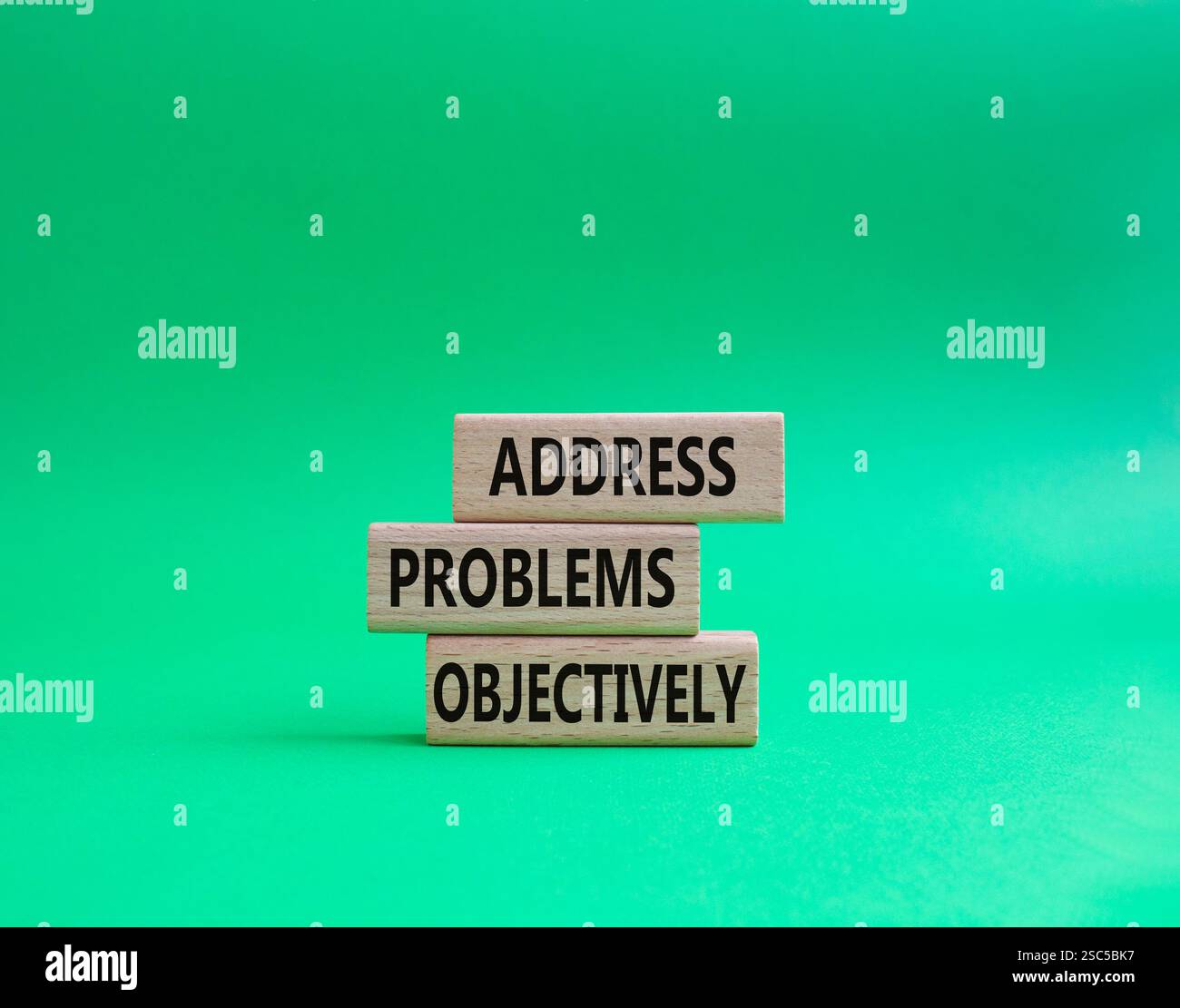 Address Problems Objectively symbol. Wooden blocks with words Address ...
