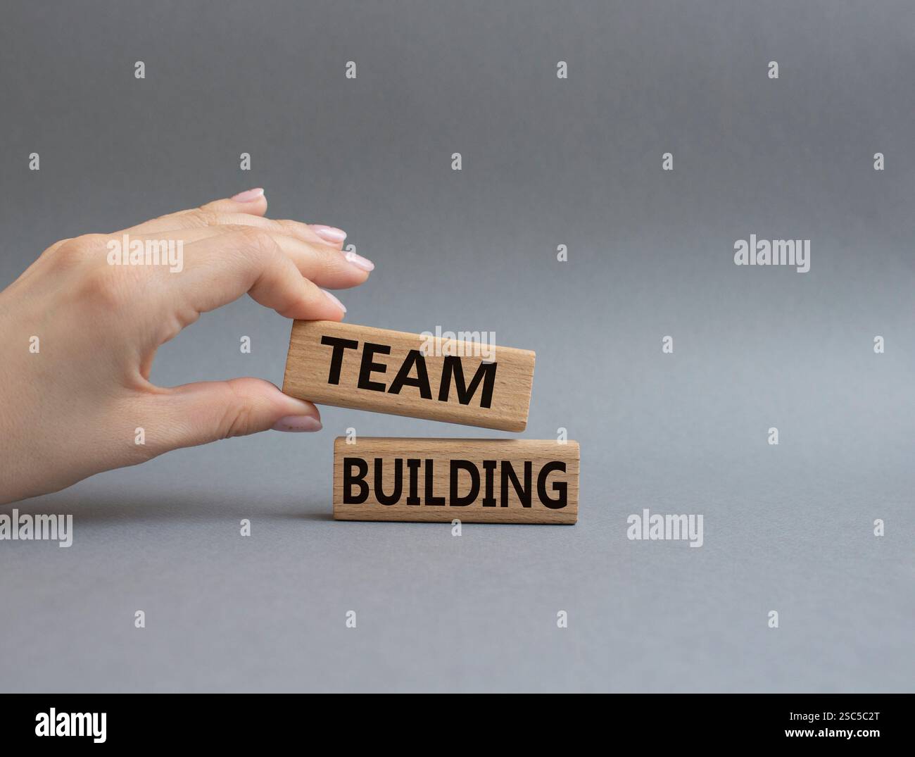 Team Building symbol. Concept word Team Building on wooden blocks ...