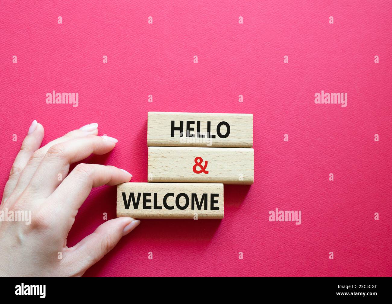 Hello and Welcome symbol. Concept words Hello and Welcome on wooden ...
