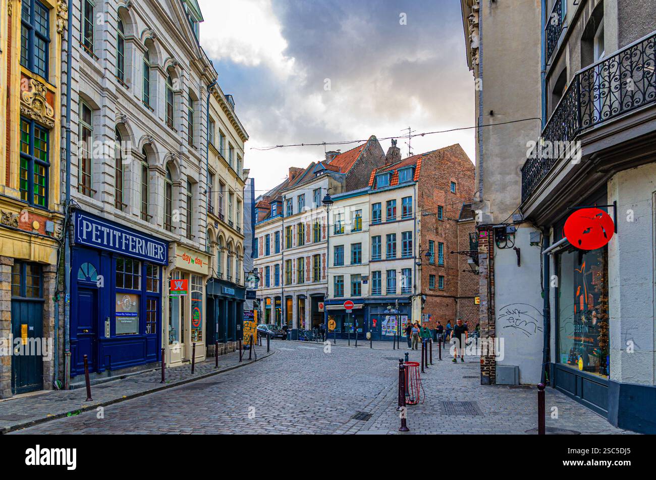 Lille, France, July 3, 2023: Empty narrow cobblestone street with ...