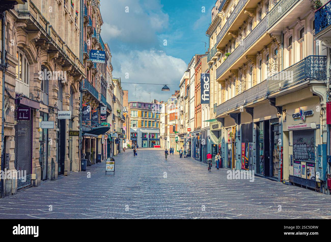 Lille, France, July 4, 2023: people walking down pedestrian street ...
