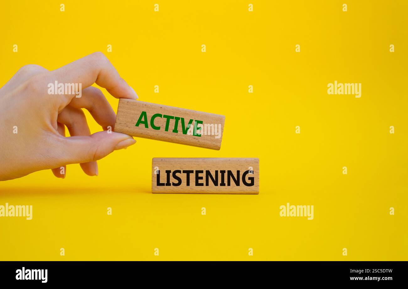 Active listening symbol. Wooden blocks with words Active listening ...