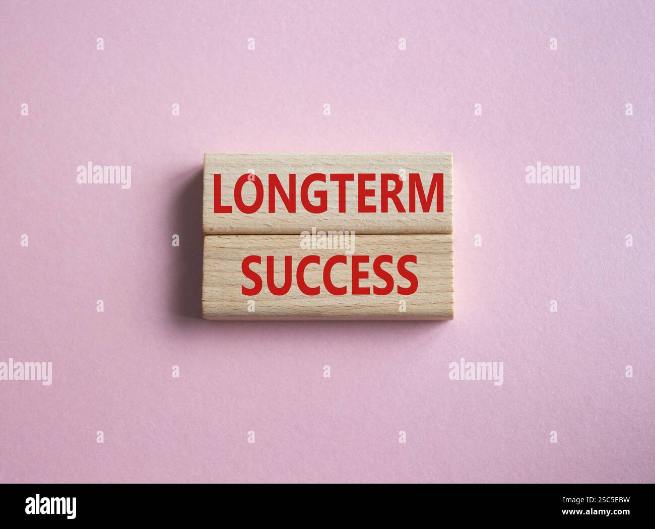 Longterm success symbol. Wooden blocks with words Longterm success ...