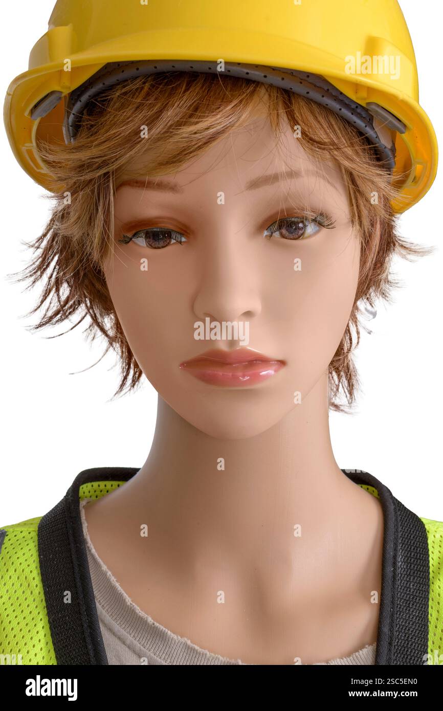 Horizontal close-up shot of a female mannequin in construction clothes ...