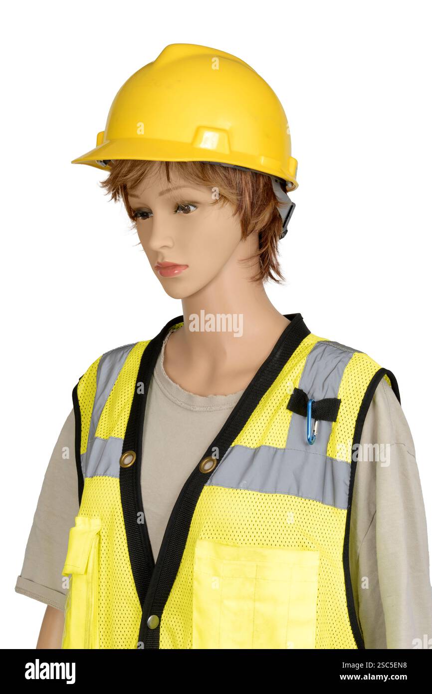 Vertical shot of a female mannequin dressed as a construction worker ...