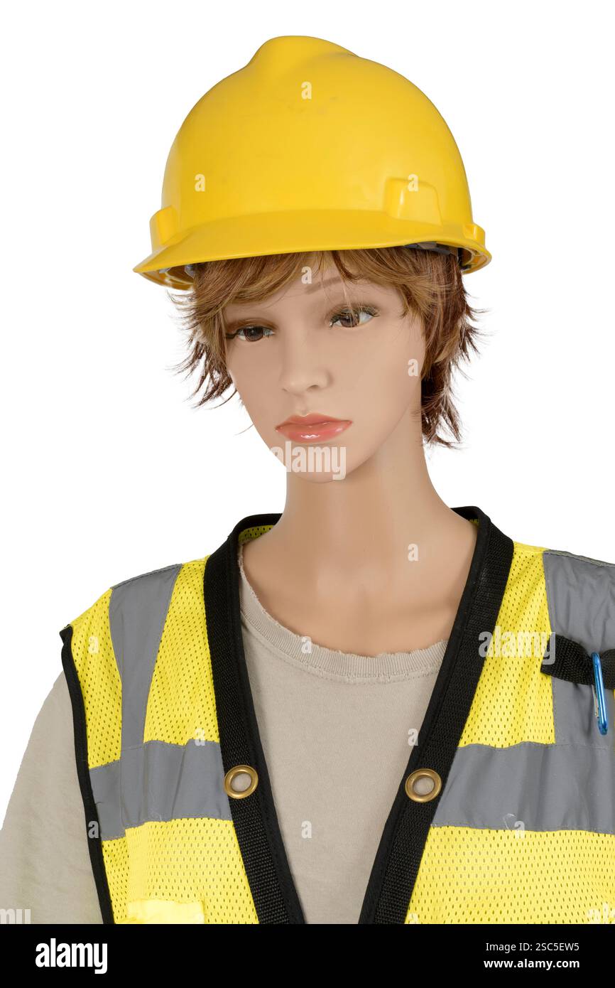 Vertical shot of a female mannequin in construction clothes from the ...