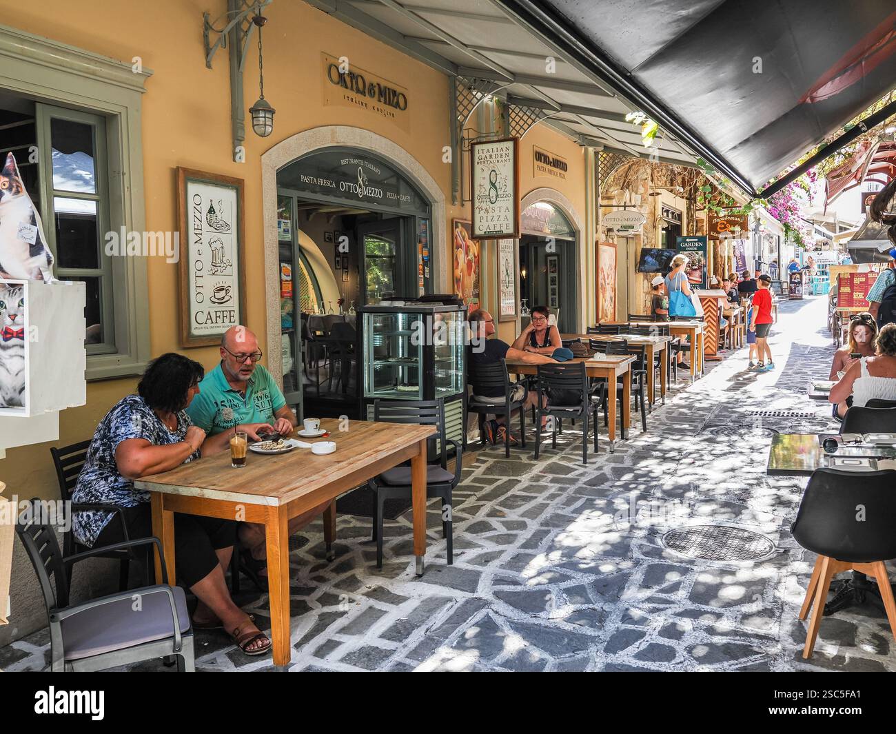 Street cafe in Kos Old Town Stock Photo - Alamy