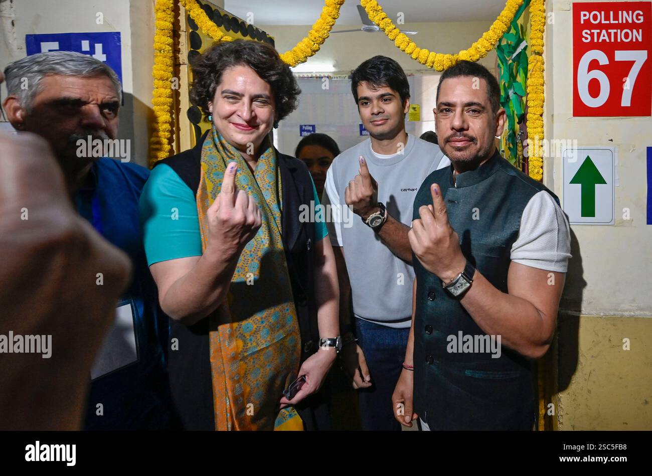NEW DELHI, INDIA - FEBRUARY 5: Congress leader Priyanka Gandhi vadra, Robert Vadra with Son ...