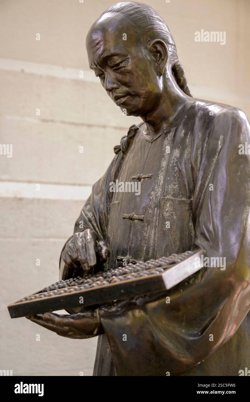 One character of Chern Lian Shan's bronze sculpture "From Chettiars to ...