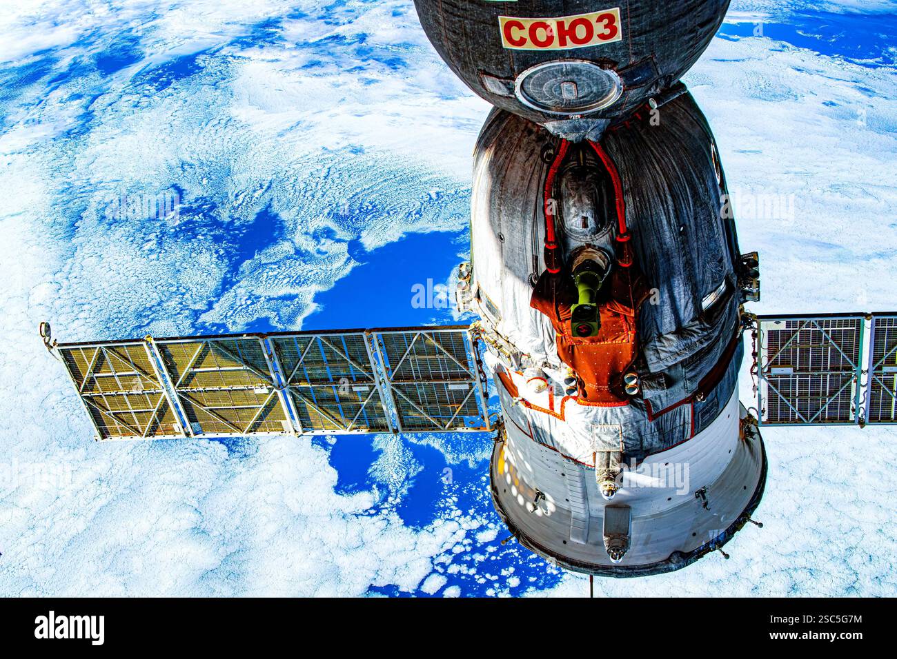 Soyuz spacecraft, planet Earth. Digital enhancement of an image by NASA ...