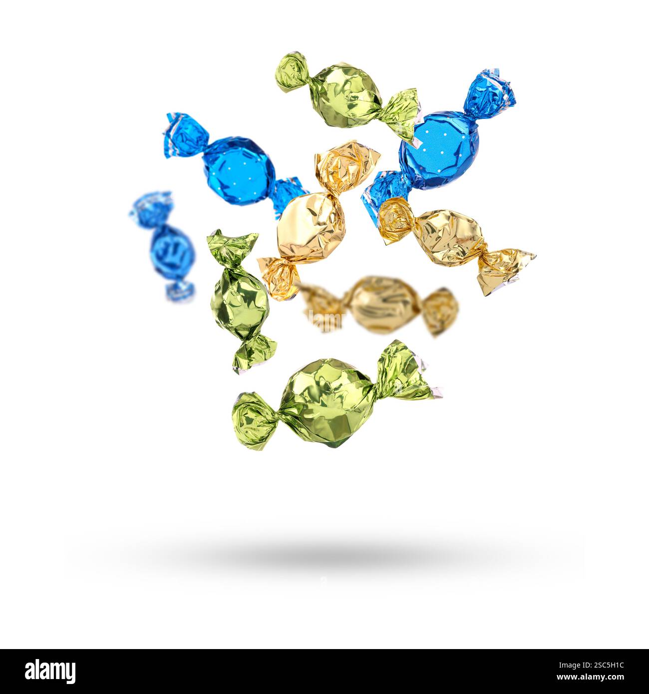 Candies in bright wrappers falling on white background Stock Photo - Alamy