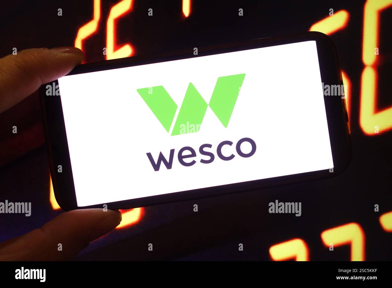 In this photo illustration, the Wesco International company logo is seen displayed on a ...