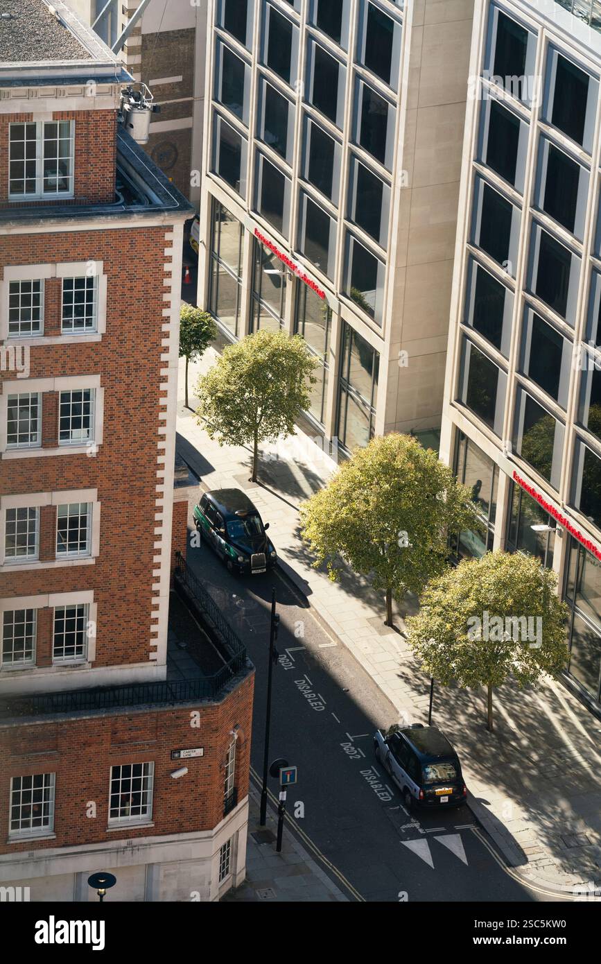 Black cab on disabled parking space, Carter Lane, EC4, London. Sunny ...