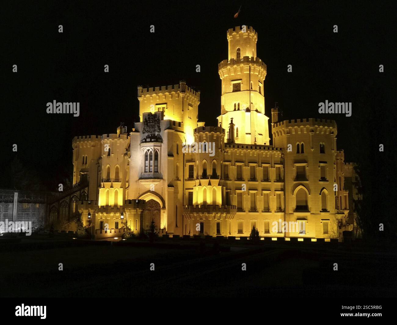 Illuminated castle at night. Hluboka is a historic chateau situated in ...