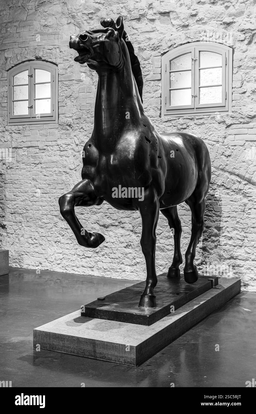 Black and white photograph, bronze sculpture of striding horses ...