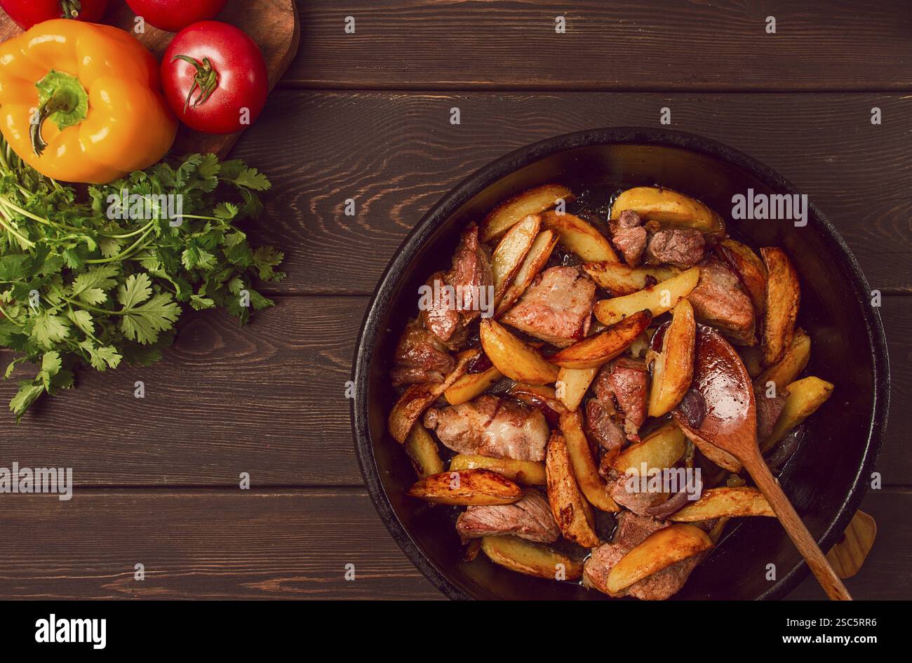 Ojakhuri, Traditional Georgian dish, fried potatoes with meat, in a ...