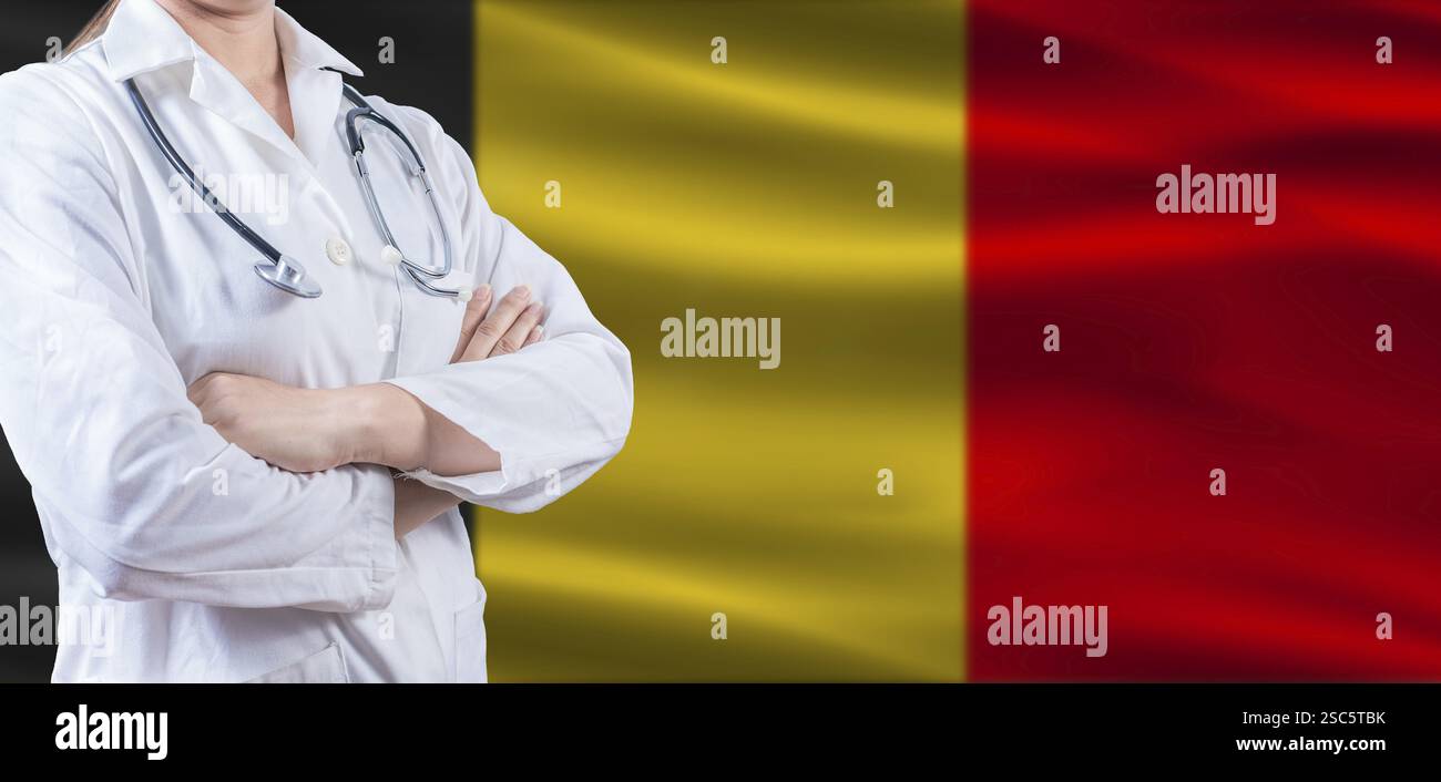 Doctor with crossed arms on Belgium flag. Belgium Health and Care ...