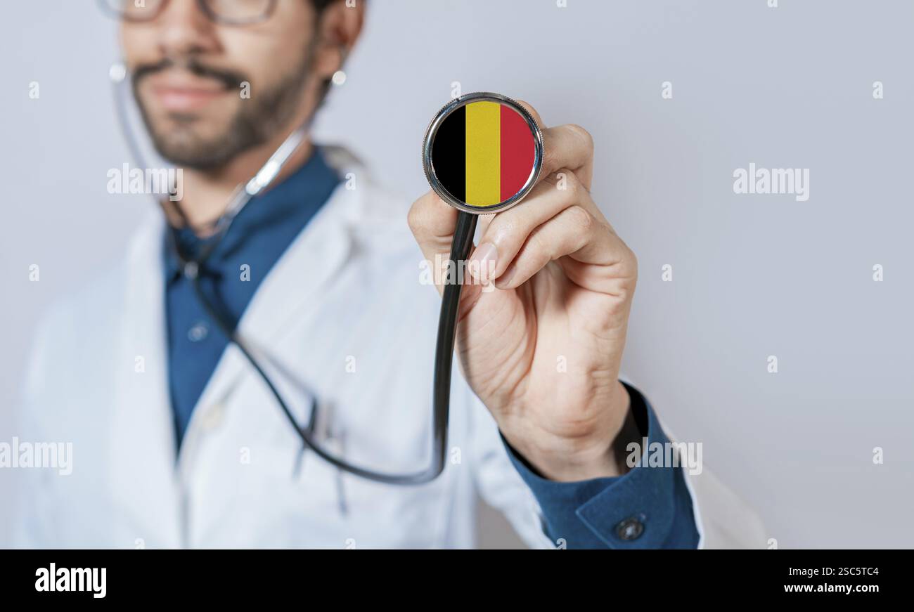 Doctor holding stethoscope with Belgium flag. Belgium Health and Care ...