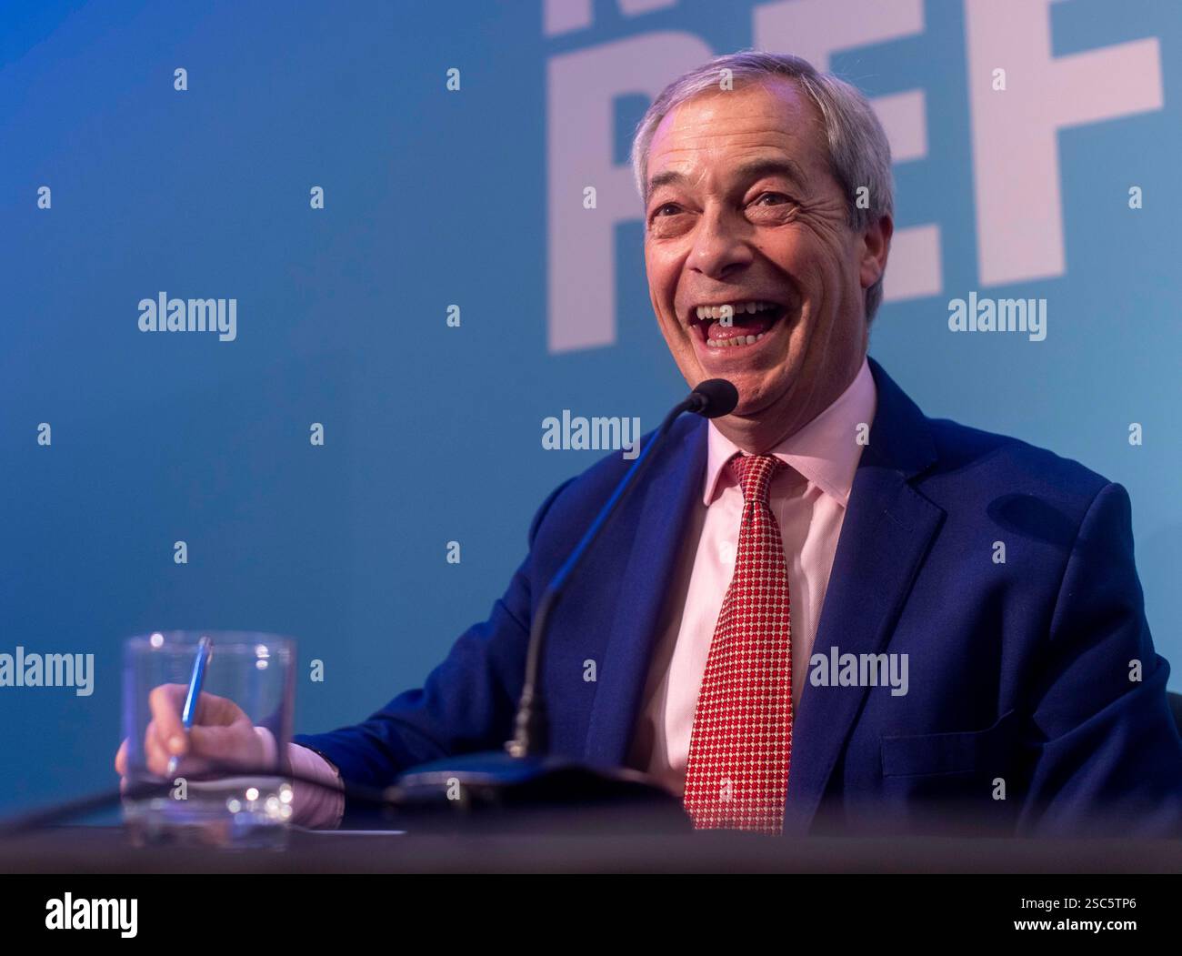 London, UK. 5th Feb, 2025. Nigel Farage, Leader of Reform UK answers ...