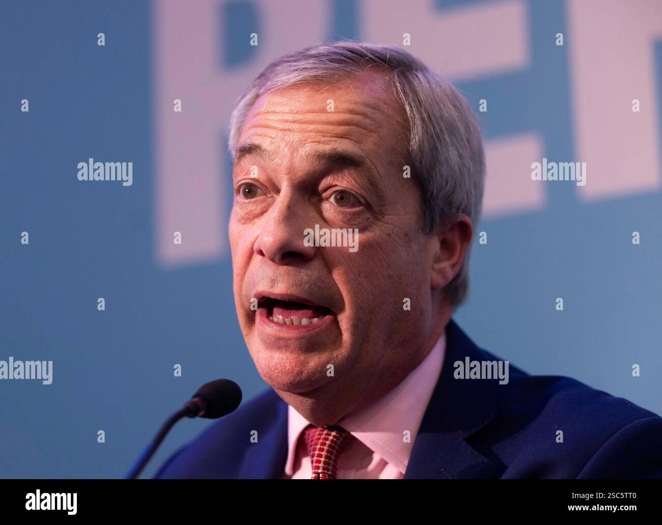 London, UK. 5th Feb, 2025. Nigel Farage, Leader of Reform UK answers ...