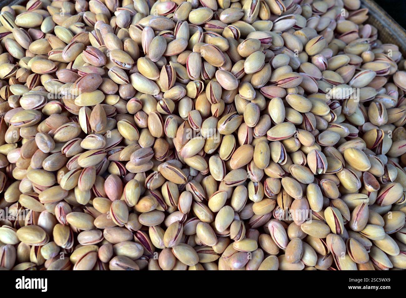Roasted pistachio nuts in shells. Natural food peanuts stacked background Stock Photo - Alamy
