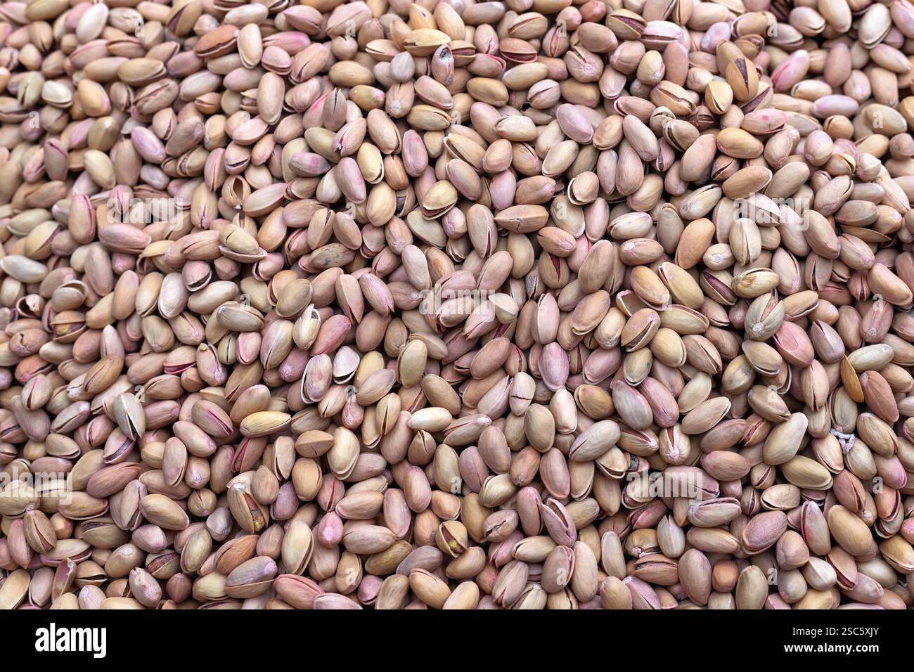 Roasted pistachio nuts in shells. Natural food peanuts stacked background Stock Photo - Alamy