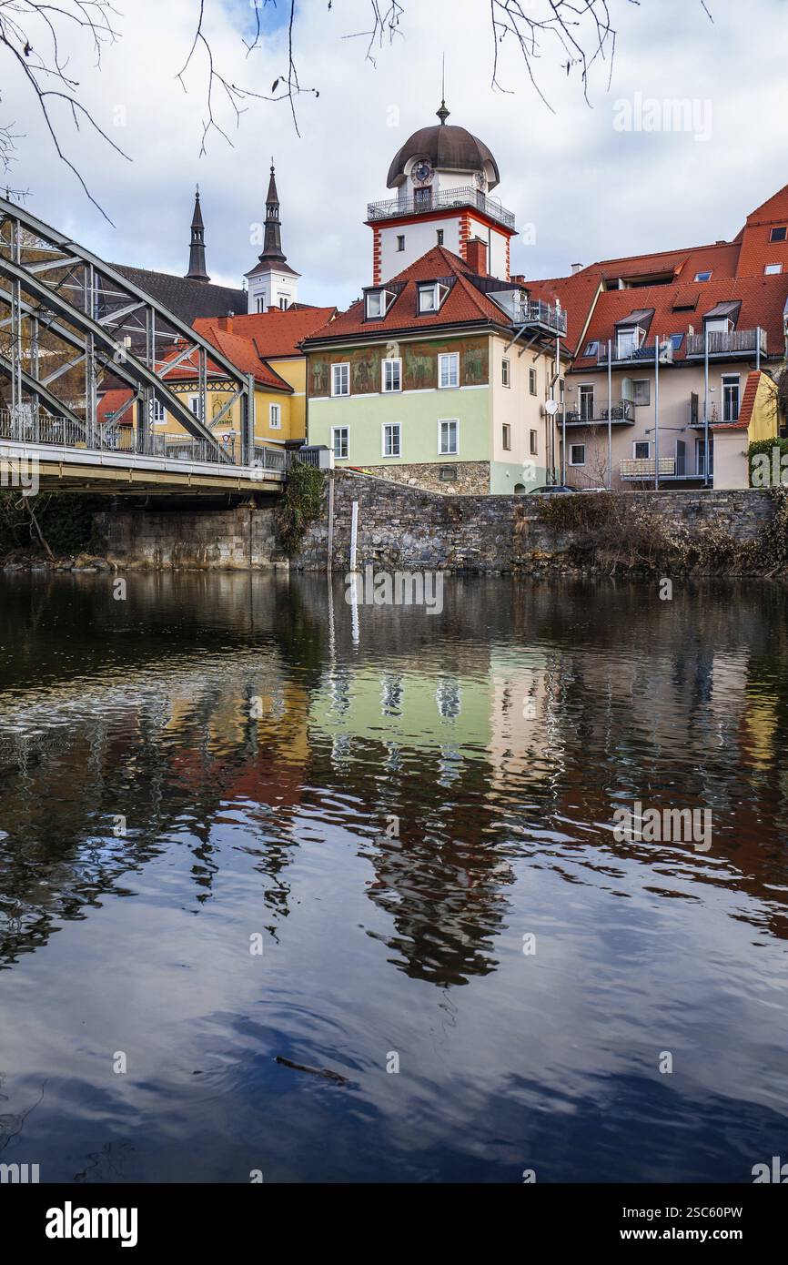 Medieval town tower, Schwammerlturm reflected in the river Mur, Leoben ...