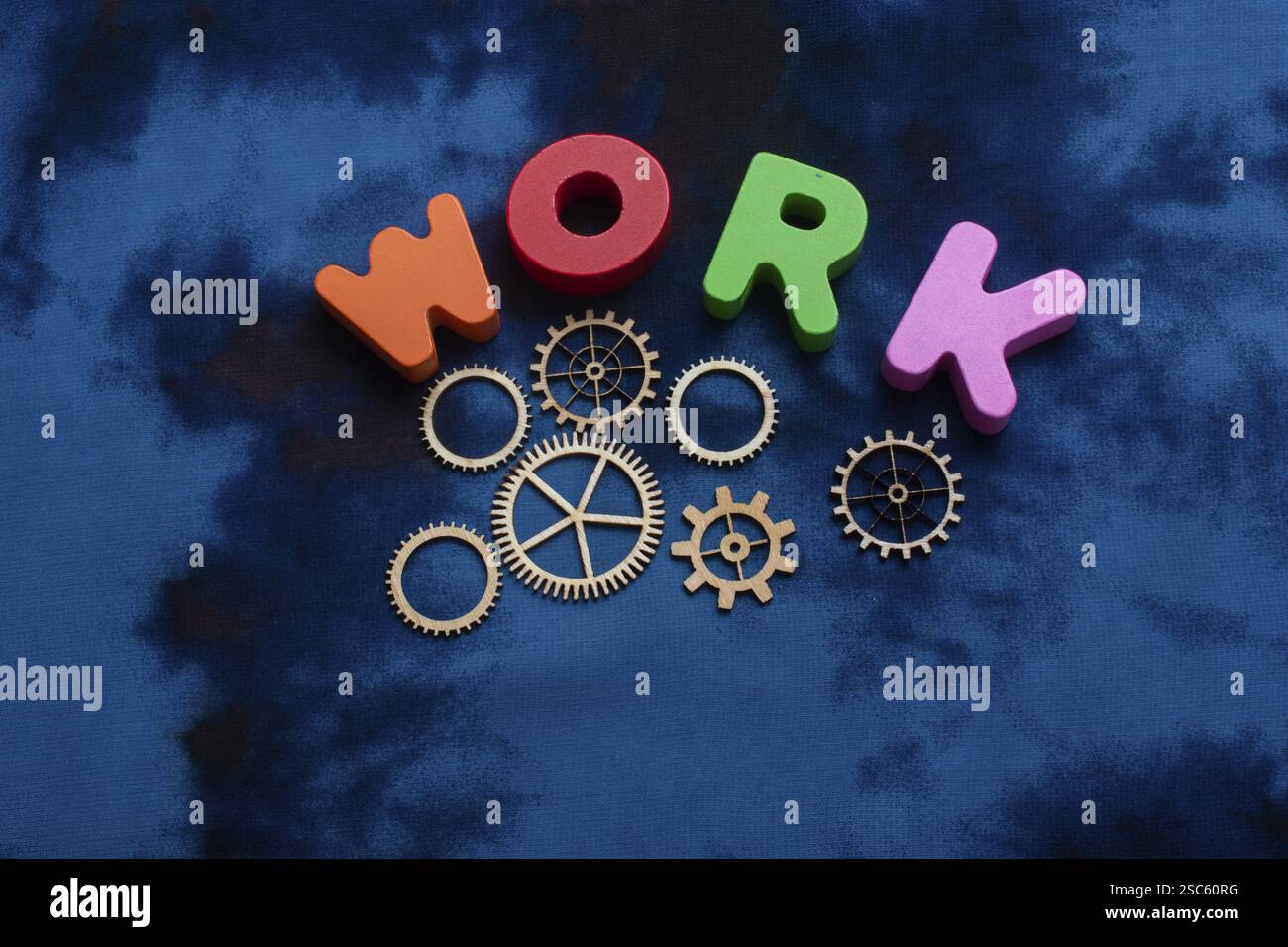 Work wording and wooden cogwheels as industry mechanism concept Stock ...