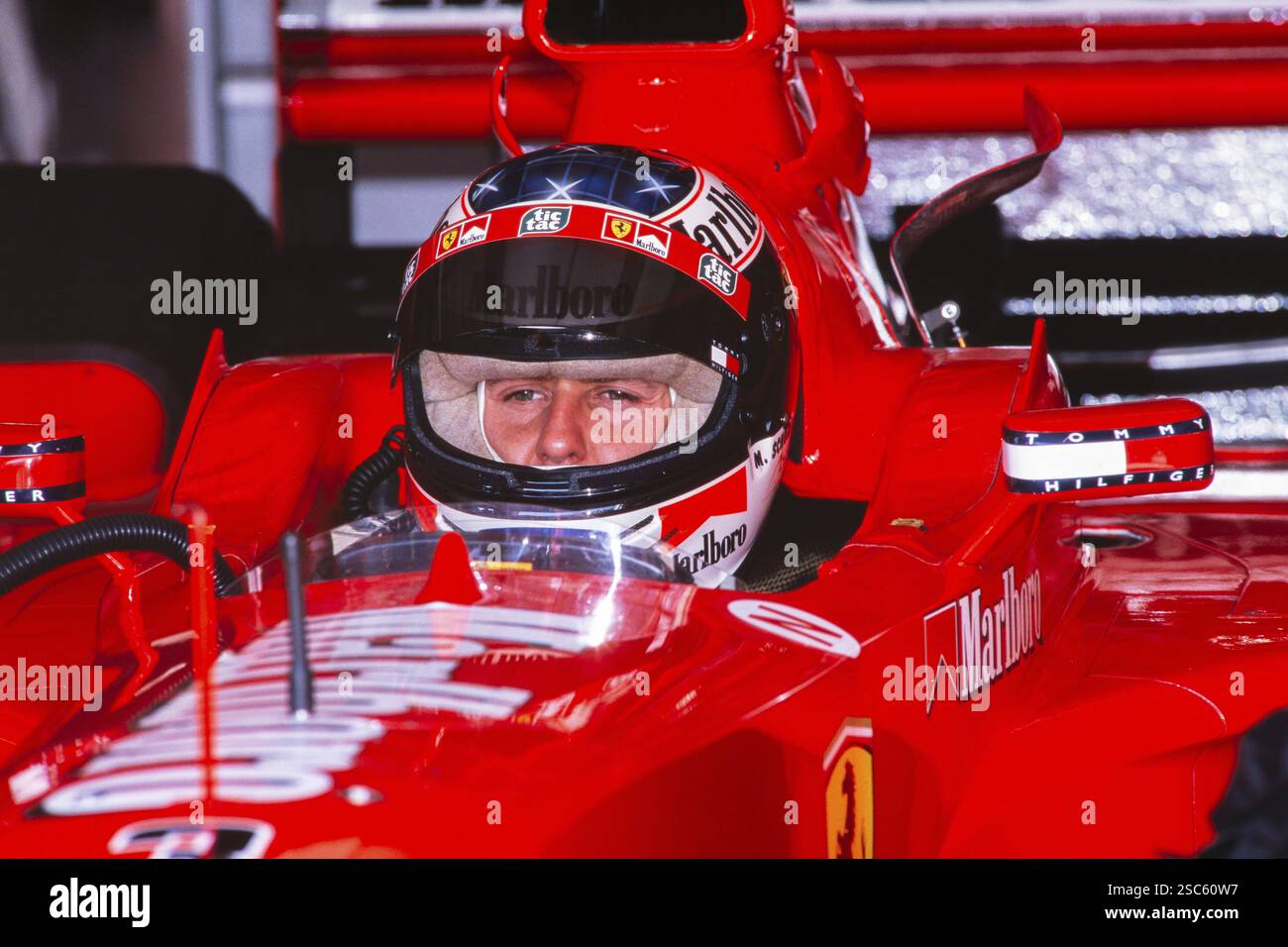Formula 1 world champion Michael Schumacher sits in the cockpit of his ...