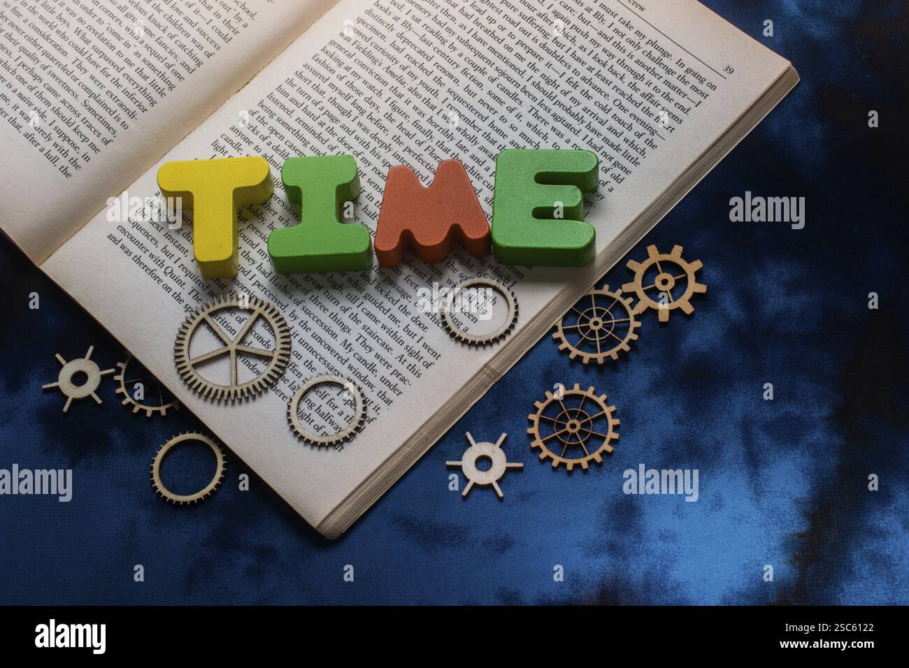 Colorful time wording with gears as time concept Stock Photo - Alamy