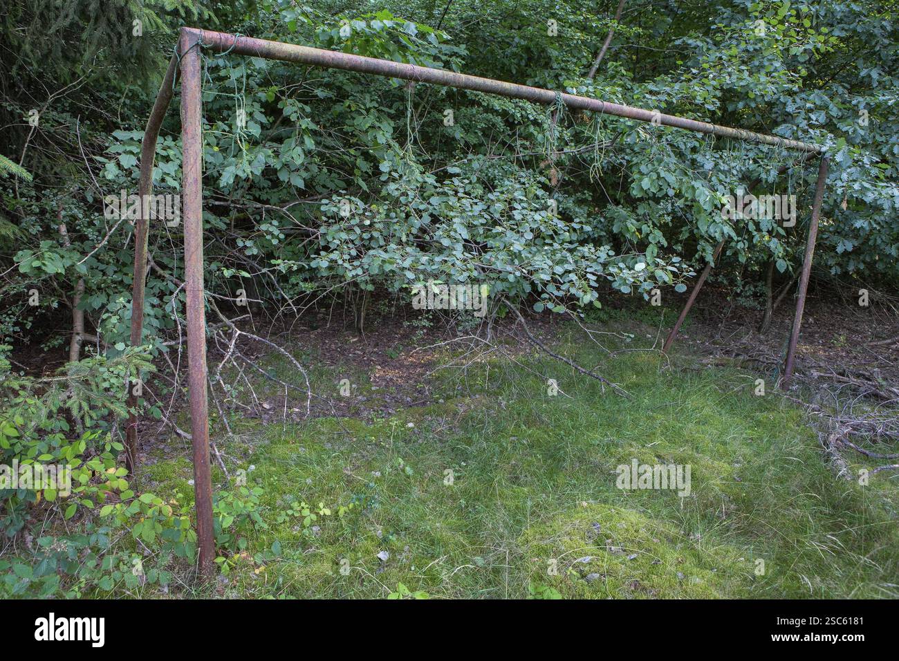 Rusty dilapidated football goal, old disused sports field, Germany ...
