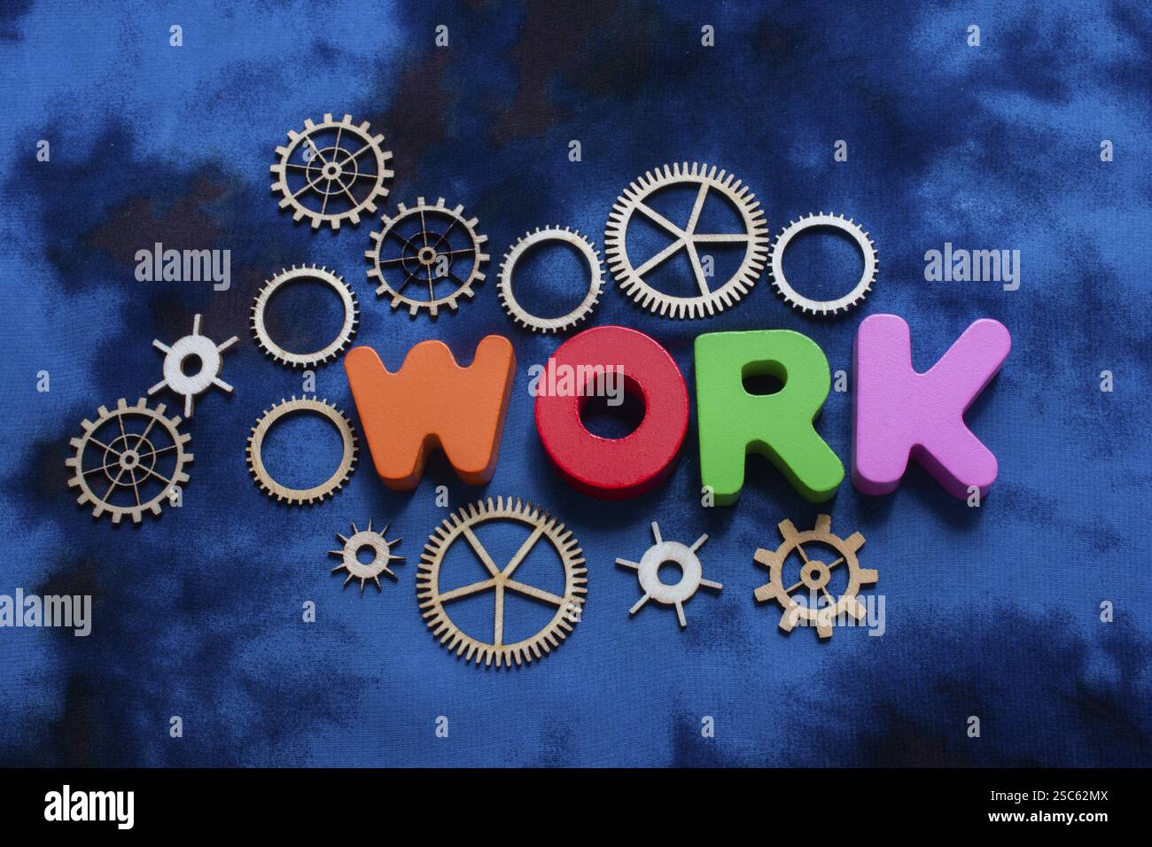 Work wording and wooden cogwheels as industry mechanism concept Stock ...