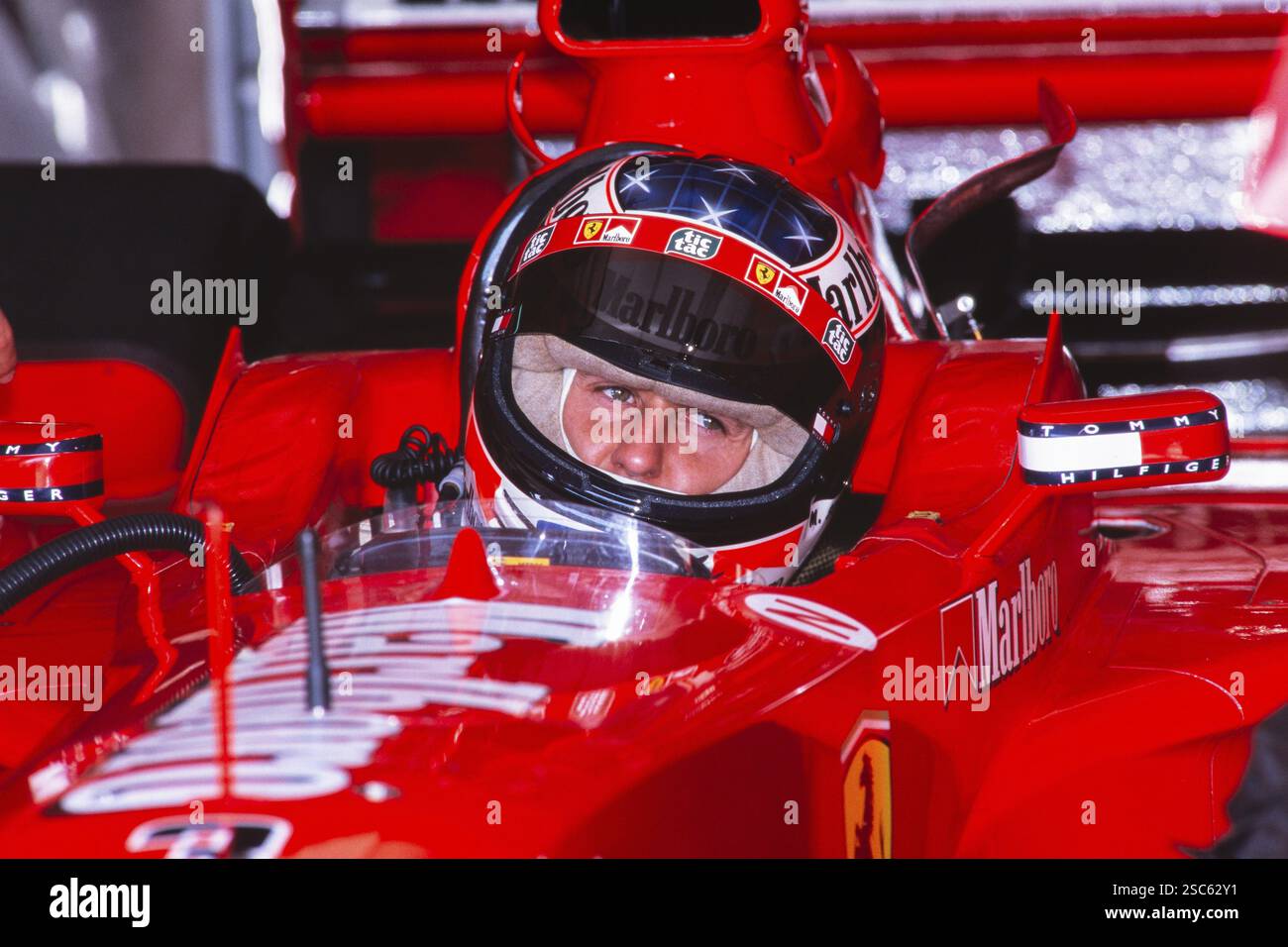 Formula 1 world champion Michael Schumacher sits in the cockpit of his ...