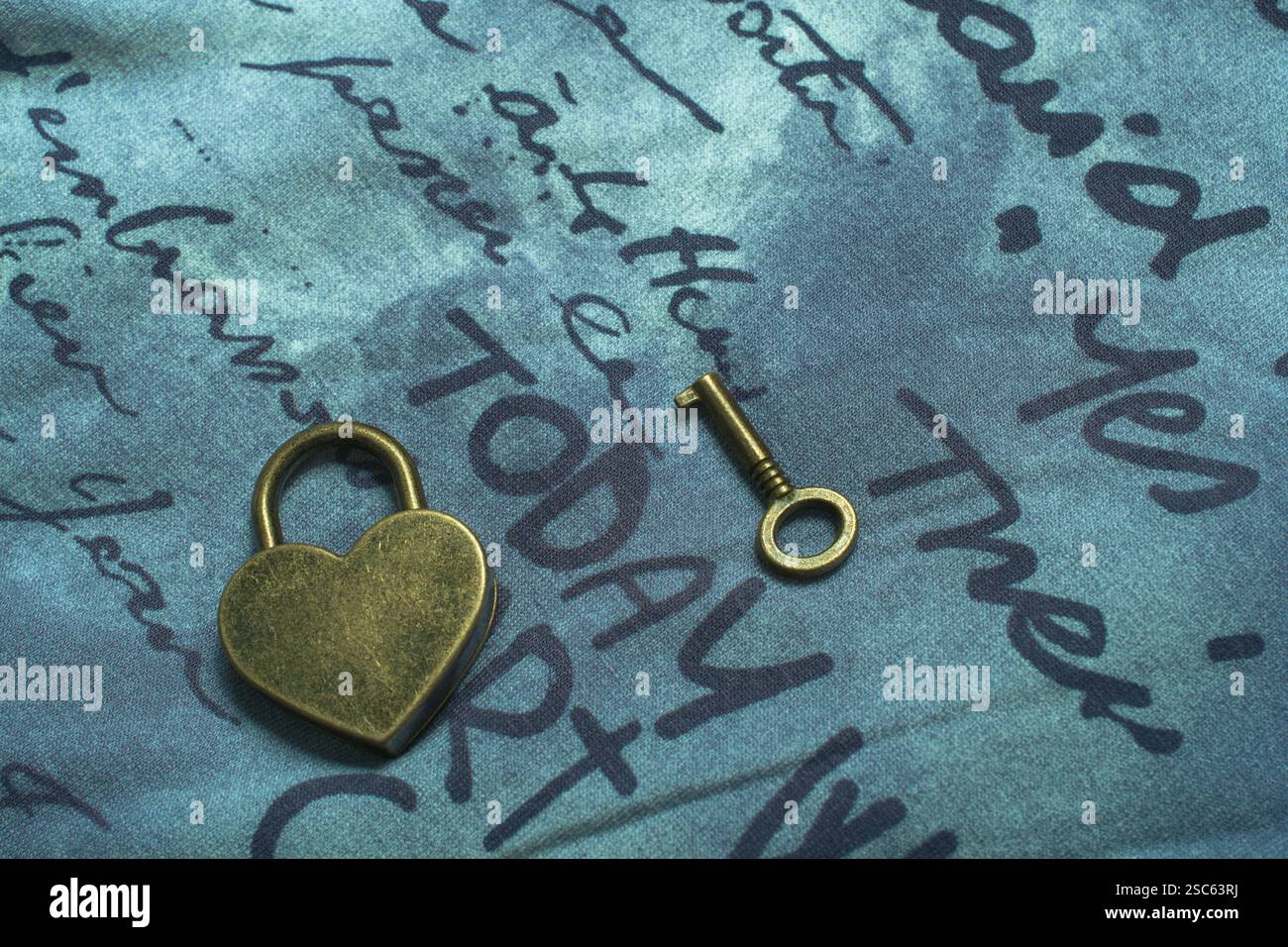 Heart shaped lock and key on an abstract background Stock Photo - Alamy
