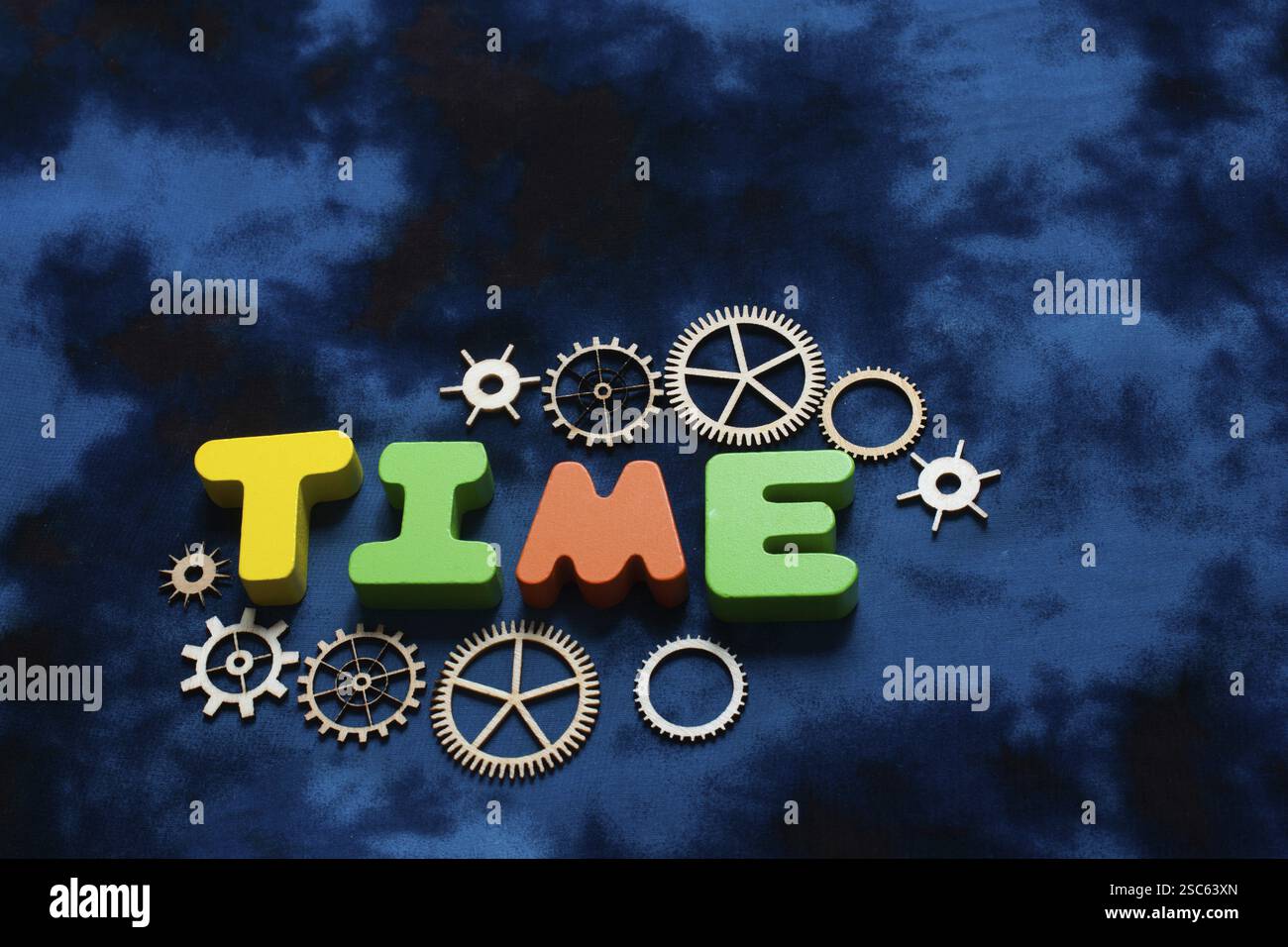Colorful time wording with gears as time concept Stock Photo - Alamy