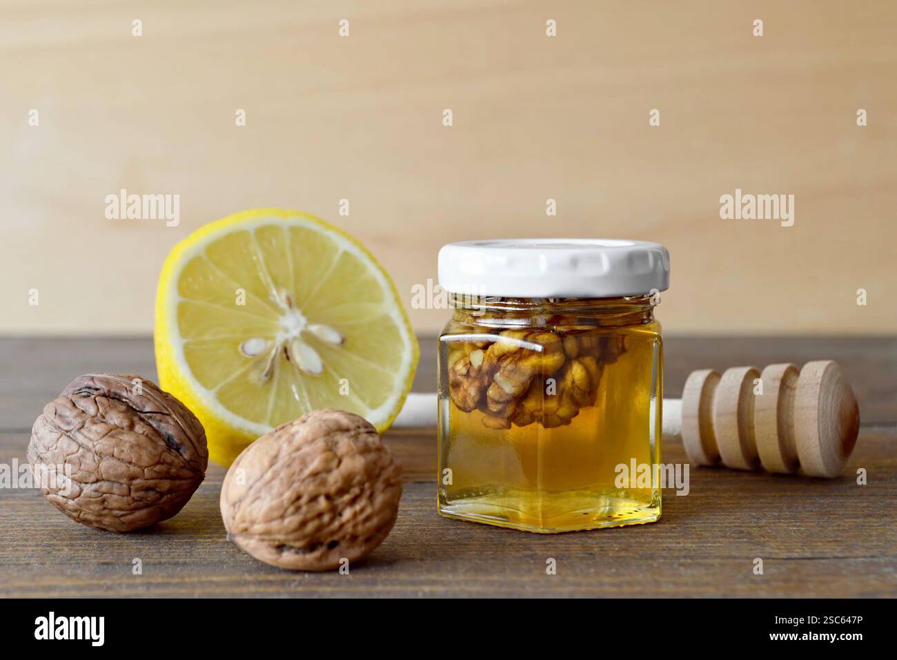 Honey, lemon and walnuts Stock Photo - Alamy