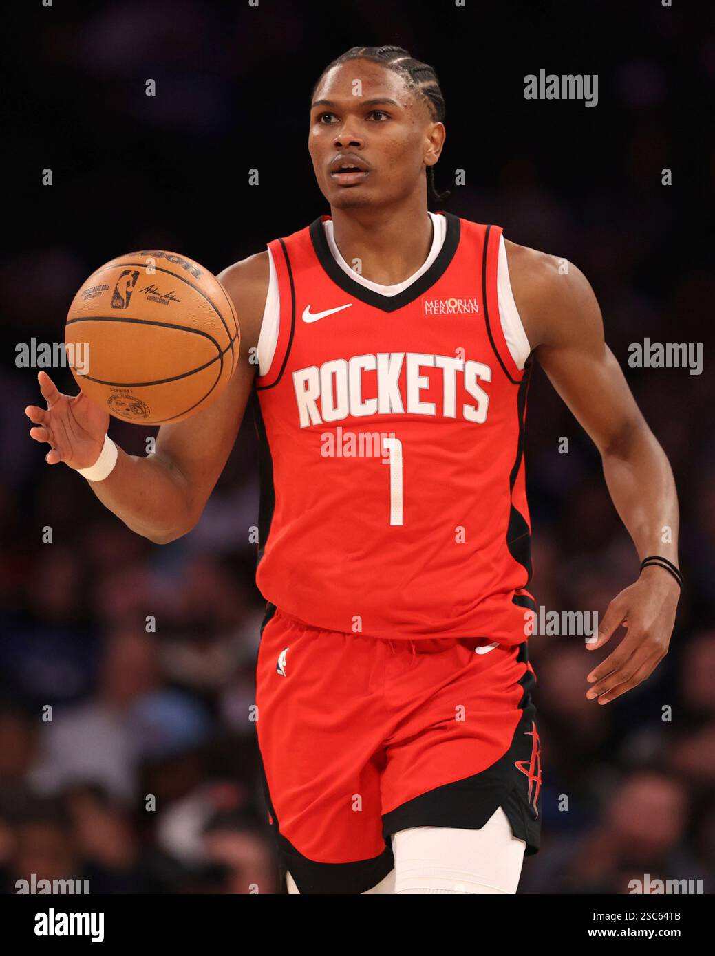 Houston Rockets' Amen Thompson dribbles the ball during the first half ...